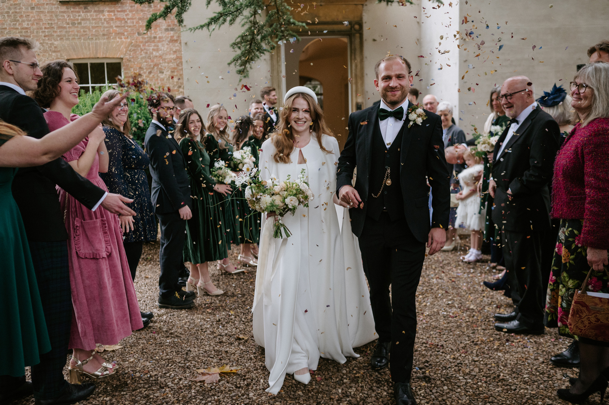 Bride in a Jesus Peiro Cape X Aswarby Rectory Wedding